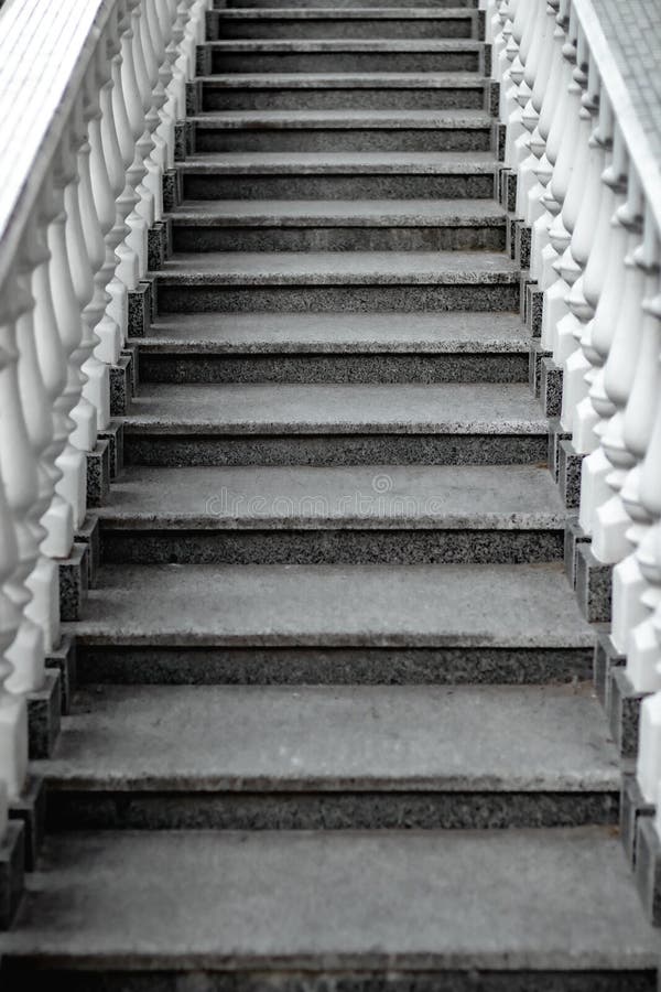 White Staircase with Balusters. Repetitive Elements in Architecture ...