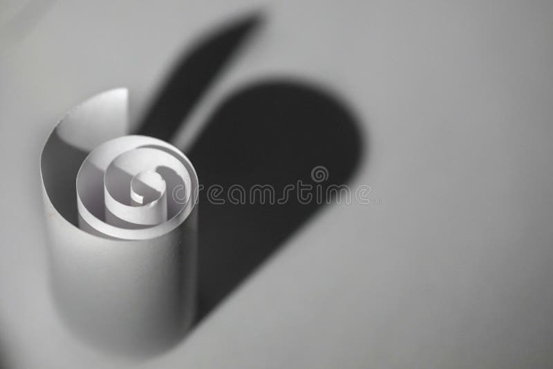 White Standing Paper Roll Twirled into Spiral with Hard Shadows, Top ...