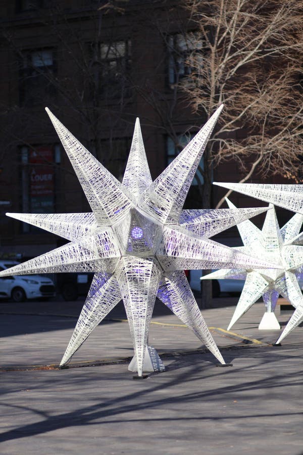 White Star-shaped Outdoor Decorations on a City Sidewalk Editorial ...