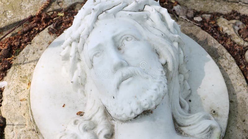 A Statue of the Head of Jesus Christ with Eyes Looking at a Fly on His ...