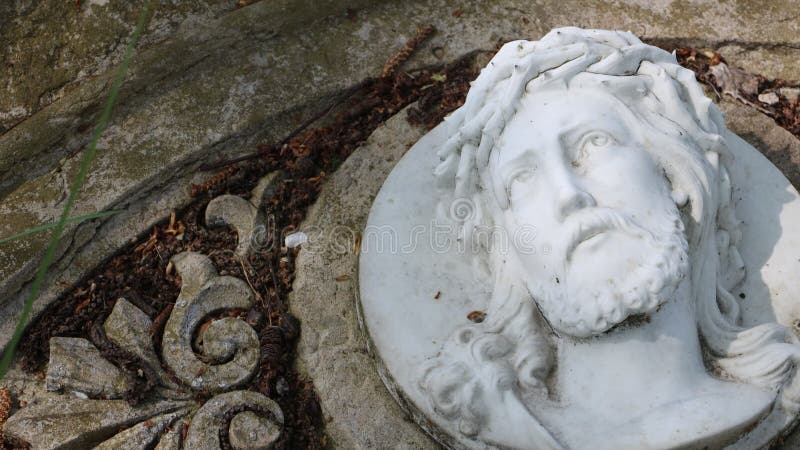 A Statue of the Head of Jesus Christ with Eyes Looking at a Fly on His ...