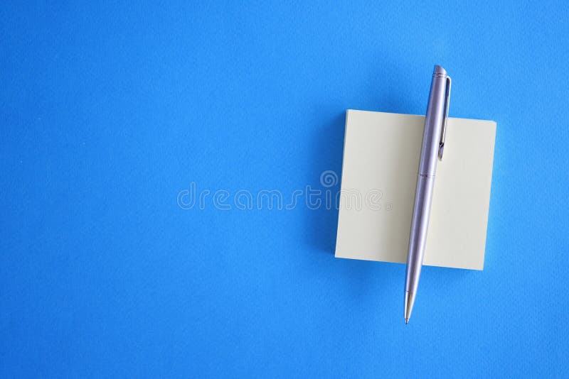White Sticky Notes with Pen on Light Blue Background Stock Image ...
