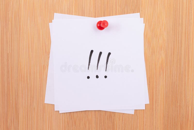 White Sticky Notes with Three Exclamation Points Pinned To the Wooden ...