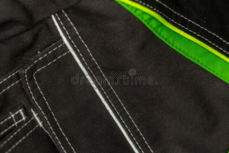 White Stitching on Black Fabric. Texture of Black Working Clothes with ...