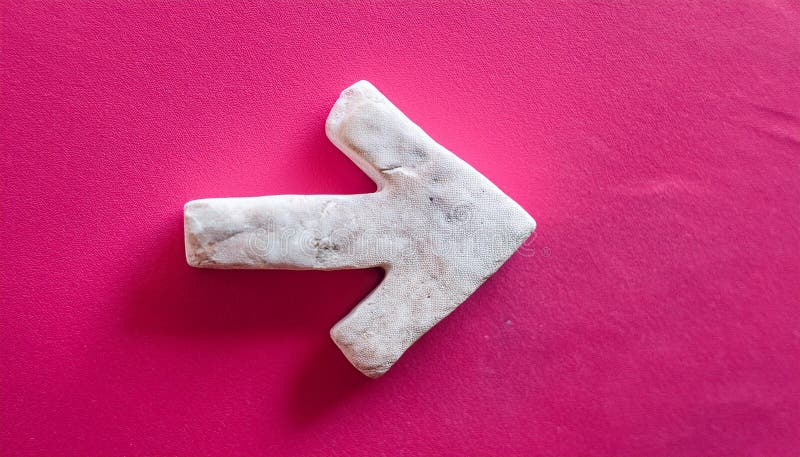 White Stone Arrow Pointing Right on Pink Backdrop. Direction Guide ...