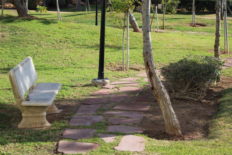 White Stone Bench in the Park Stock Photo - Image of beautiful ...