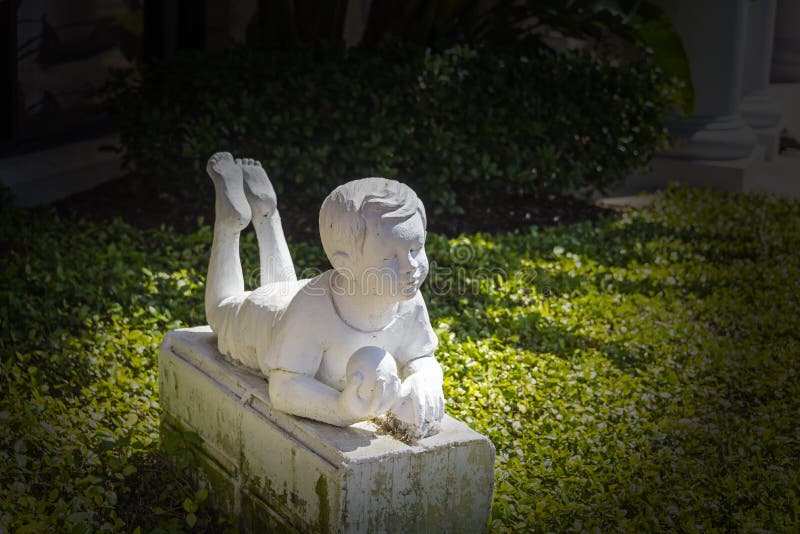 White Stone Boy stock photo. Image of cupid, child, monument - 92274350