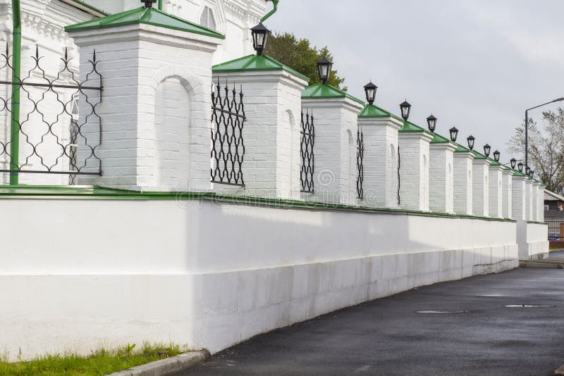 Stone Fence with Pillars and Wrought Iron Bars Stock Image - Image of ...