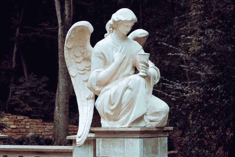 White Stone Guardian Wing Angel with Goblet Stock Image - Image of ...