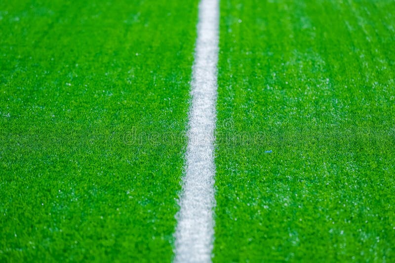 White Stripe on Green Grass on the Playing Field, Marking Stock Image ...