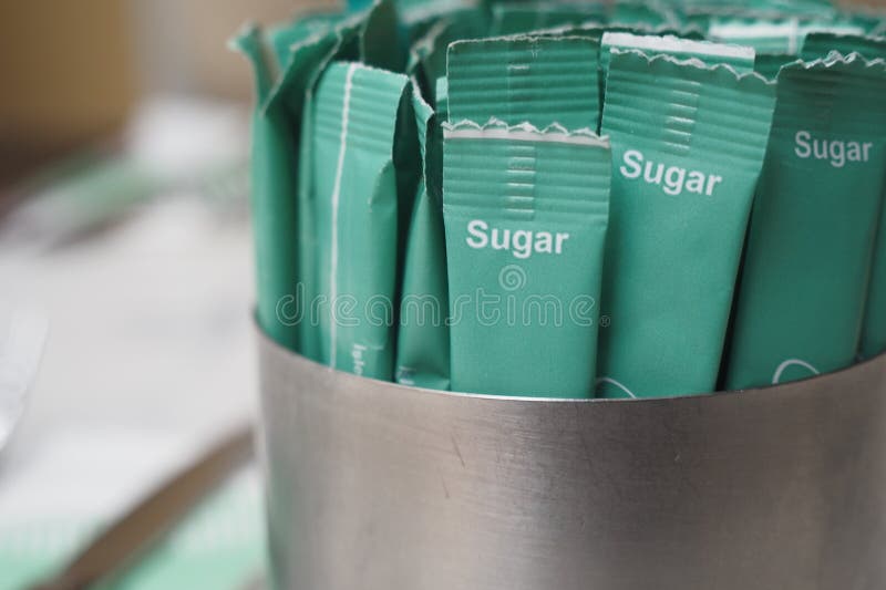 White Sugar in a Paper Packet on Table Stock Image - Image of excess ...