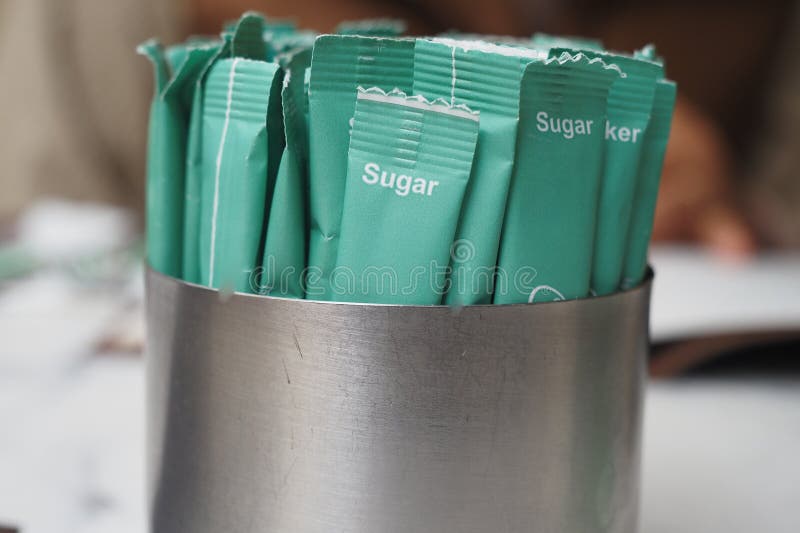 White Sugar in a Paper Packet on Table Stock Image - Image of text ...