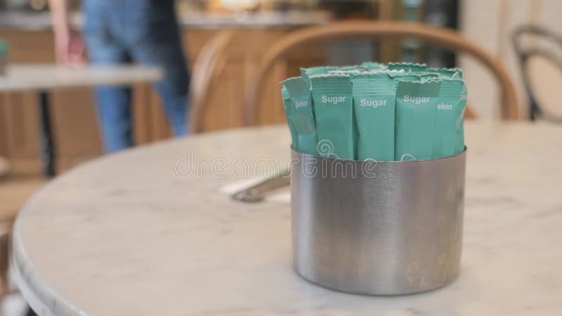 White Sugar in a Paper Packet on Table Stock Footage - Video of ...