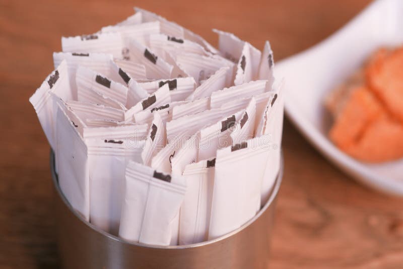White Sugar in a Paper Packet on Table Stock Photo - Image of piece ...