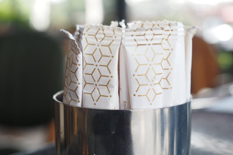 White Sugar in a Paper Packet on Table Stock Photo - Image of cubes ...