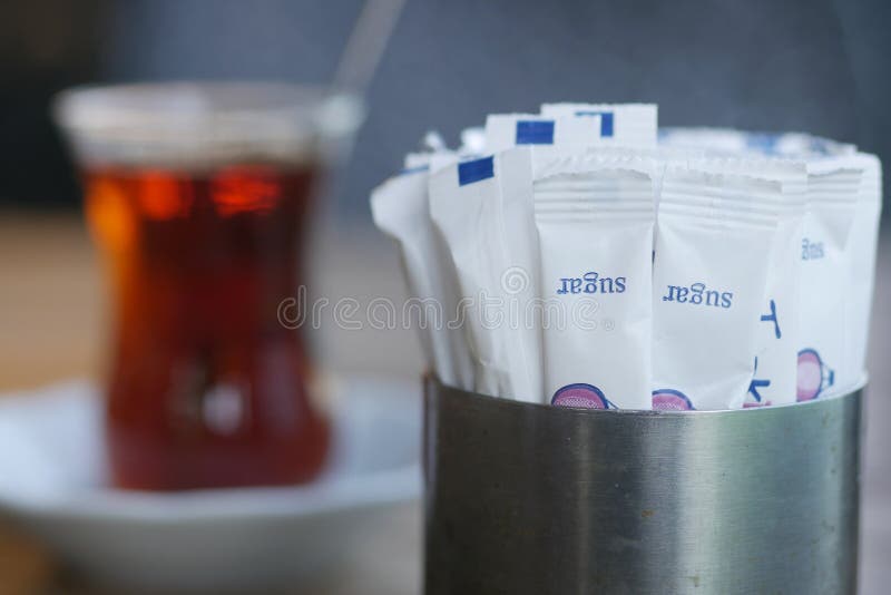 White Sugar in a Paper Packet on Table Stock Photo - Image of cubes ...