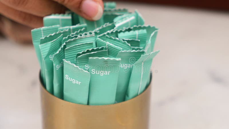 White Sugar in a Paper Packet on Table Stock Footage - Video of grain ...