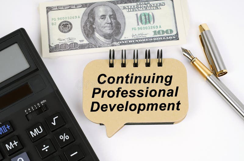 On a White Surface, a Calculator, Dollars, a Pen and a Sign with the ...