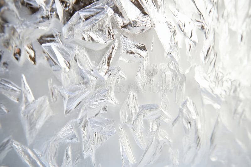 A White Surface with a Frosted, Glass-like Texture. the Surface Appears ...