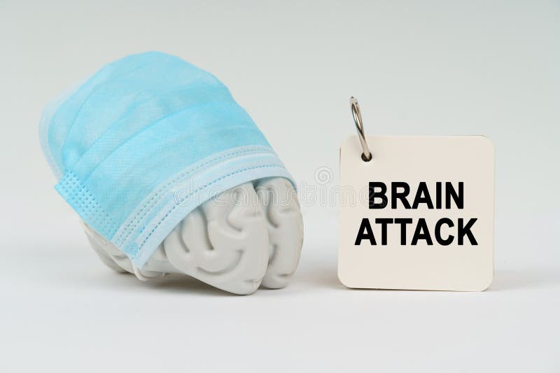 On a White Surface Next To the Brain There is a Notepad with the ...