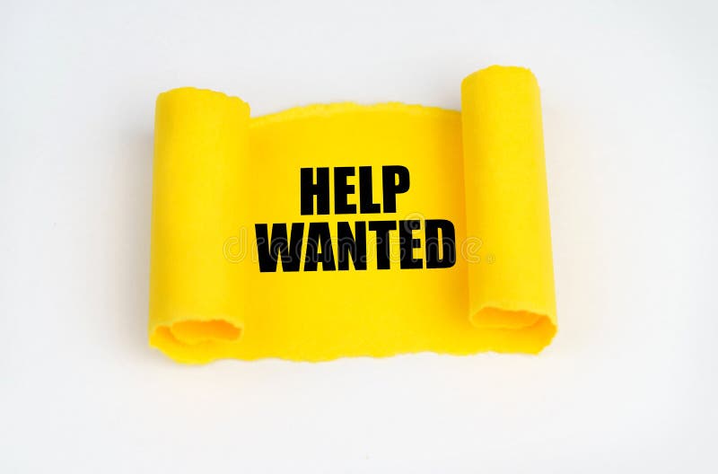 On a White Surface, a Yellow Scroll of Paper with the Inscription ...