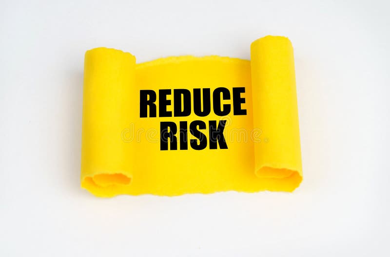 On a White Surface, a Yellow Scroll of Paper with the Inscription ...