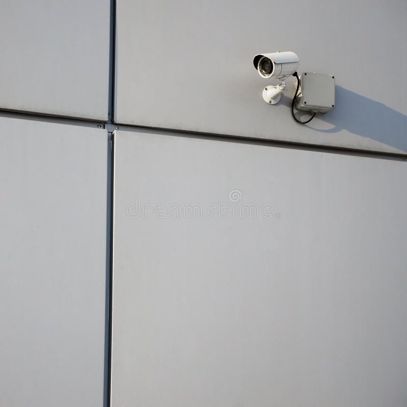 White Surveillance Camera Built into the Metal Wall of the Offic Stock ...