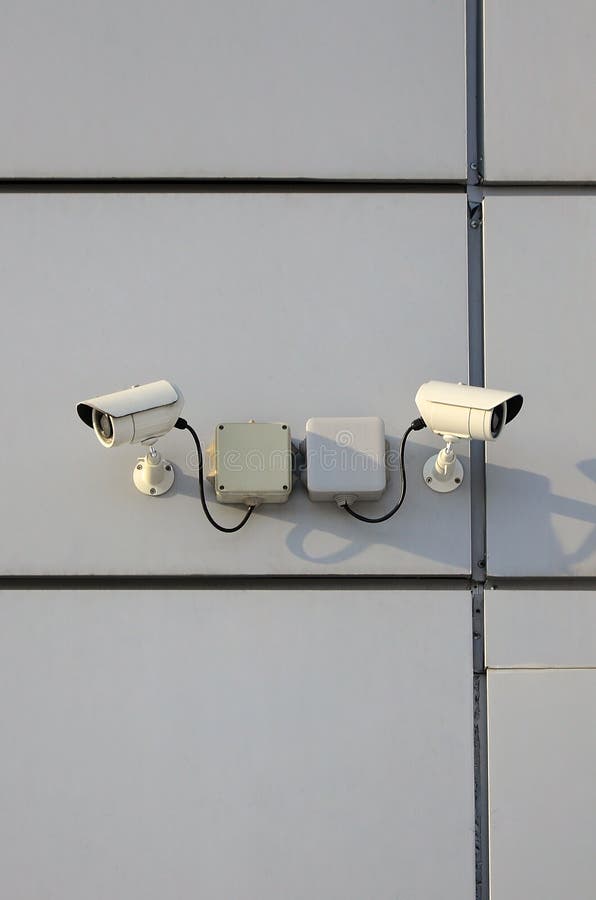 White Surveillance Camera Built into the Metal Wall of the Offic Stock ...