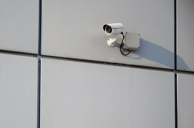White Surveillance Camera Built into the Metal Wall of the Offic Stock ...