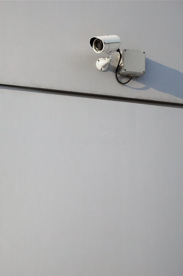White Surveillance Camera Built into the Metal Wall of the Offic Stock ...