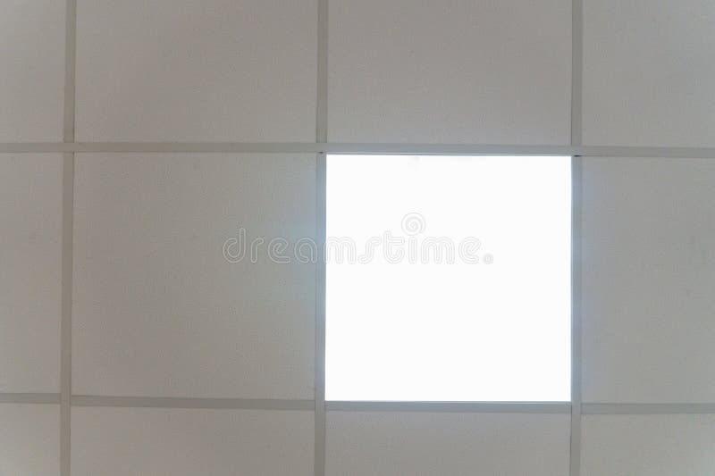 Square Fluorescent Lamps on the Ceiling. Thick Pipes of the Air ...