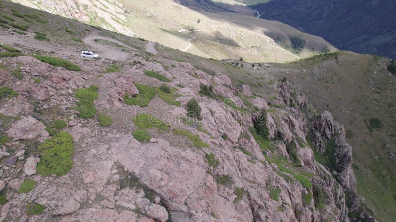 The SUV Overcomes the Mountain Route through Gorge Stock Footage ...