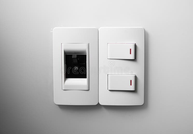 White Switch on a White Wall with Two Switches and One Common Switch ...
