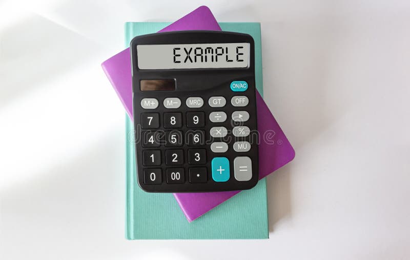 On a White Table is a Calculator Labeled EXAMPLE. Business Concept ...