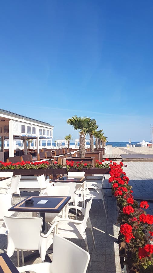 White Table and Chair of a Beach Bar Stock Image - Image of holiday ...