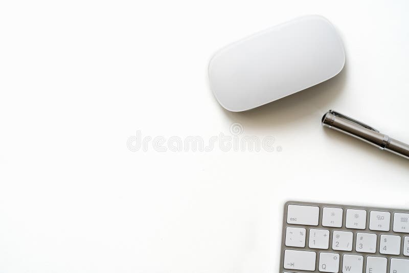 White Table with Luxury Pen, Computer Keyboard and Mouse Stock Image ...