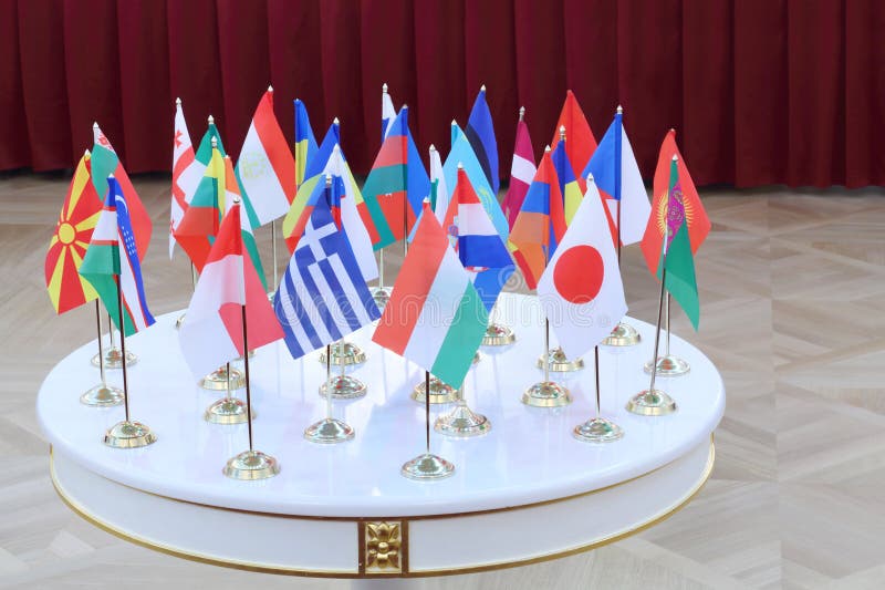 White Table with 28 National Flags at the Stock Photo - Image of ...