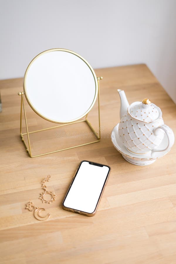 On a White Table There is a Cup of Coffee,phone Mock Up and Mirrow ...