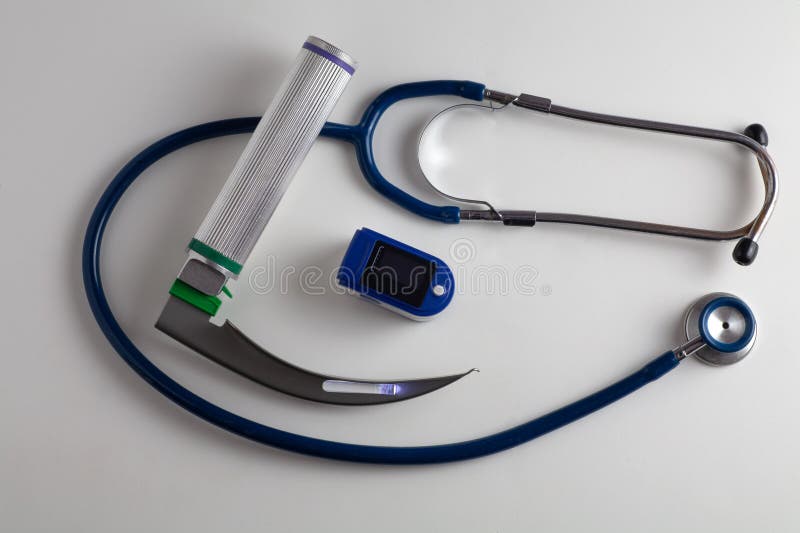 On the White Table There is a Laryngoscope, Phonendoscope and Pulse ...