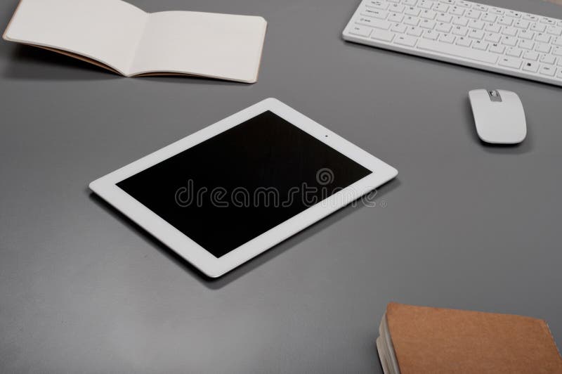 White Tablet on a Grey Office Desk Stock Image - Image of strategy ...