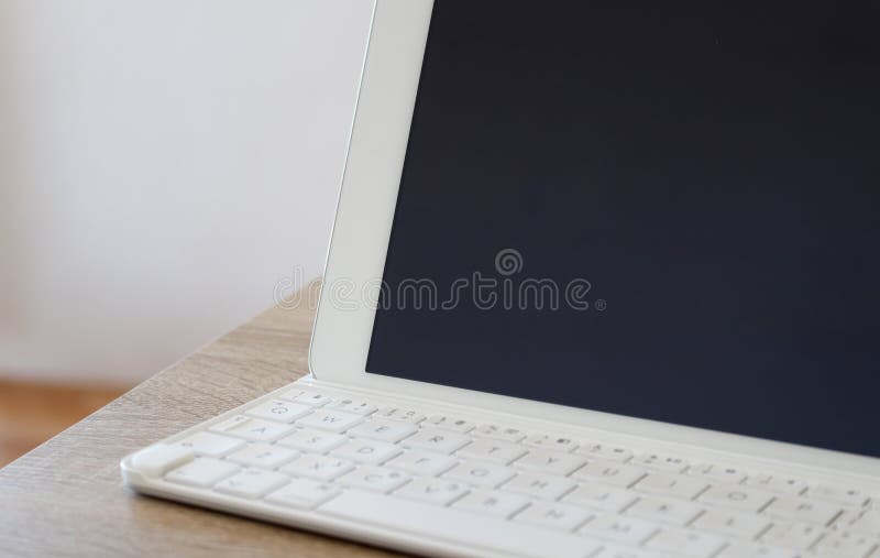 White Tablet with Keyboard on the Table Stock Image - Image of wood ...
