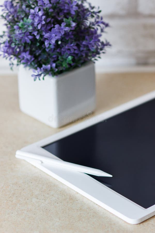 White Tablet on the Table, Blurred Background Stock Photo - Image of ...