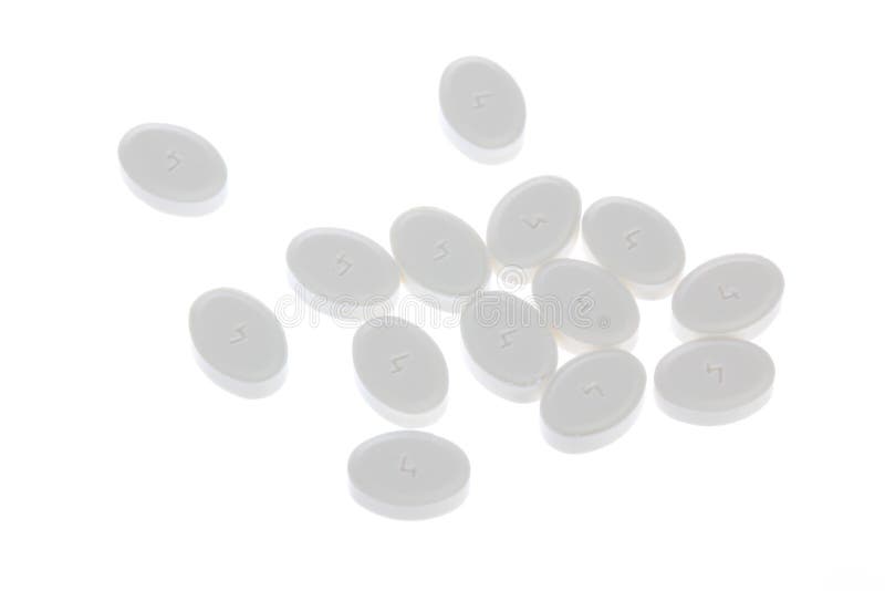 White Tablets Close-up on a Blue Background. Stock Photo - Image of ...