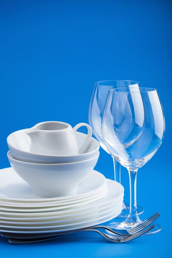 White Tableware Over Blue Background Stock Image - Image of dinner ...
