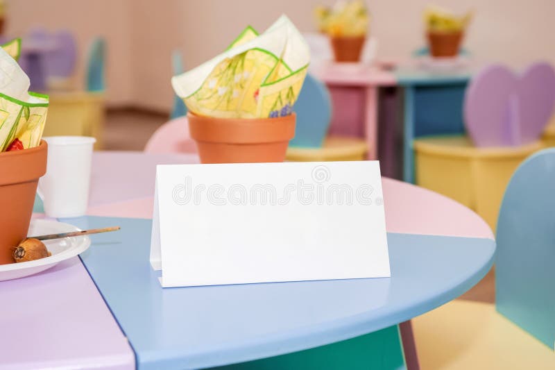 White tag on colored table stock image. Image of color - 38976755