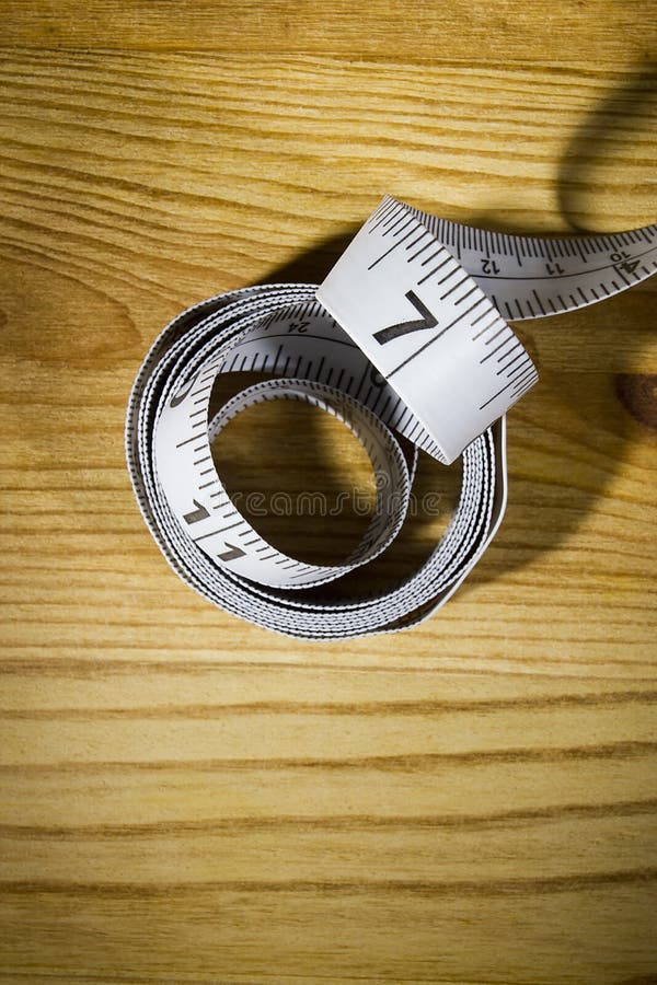 White tailor meter stock photo. Image of table, closeup - 190835576