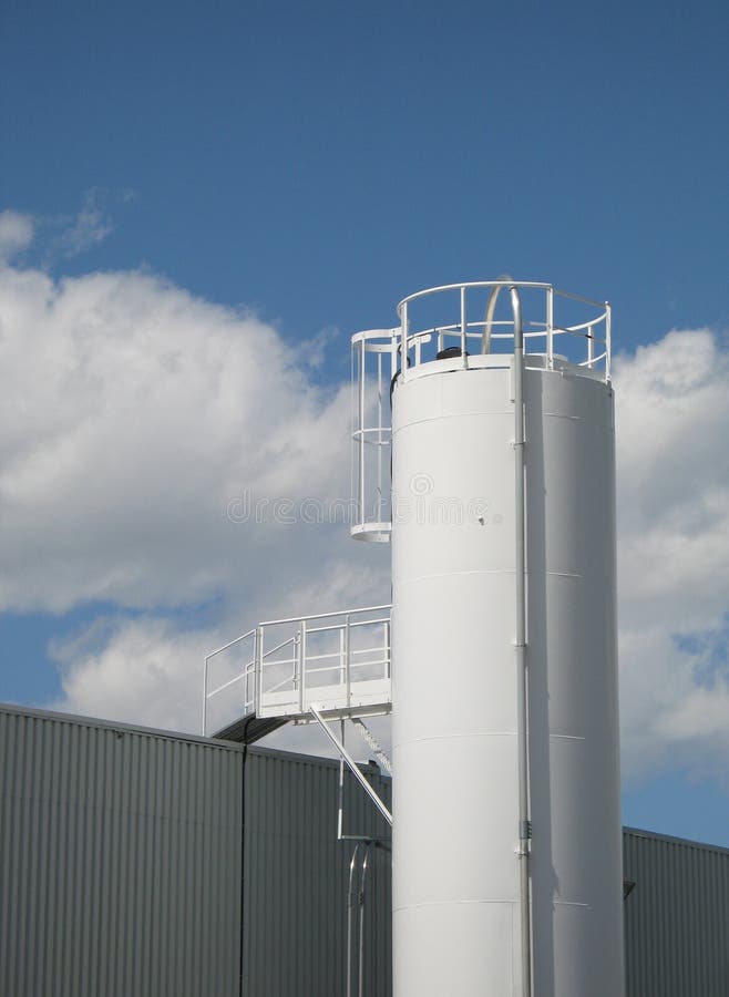 White tall industrial silo stock photo. Image of industry - 6189426