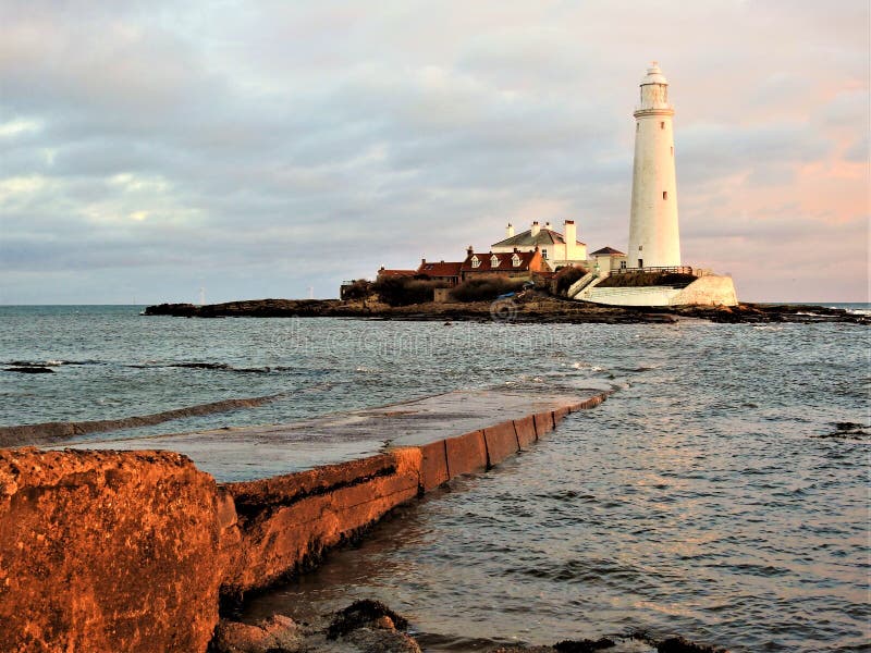 A White Mayak in Sea with a Dominant Pier Stock Image - Image of white ...