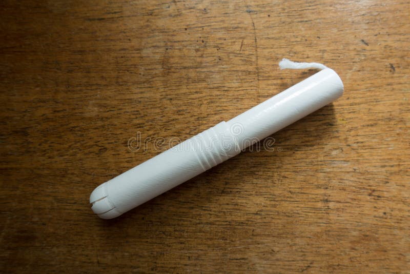 White Tampon with Cardboard Applicator on Wood Stock Image - Image of ...