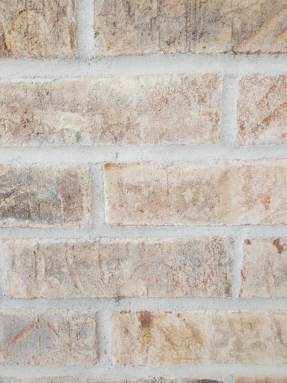 White, Tan, and Light Red Brick with Light Gray Mortar Up Close Stock ...